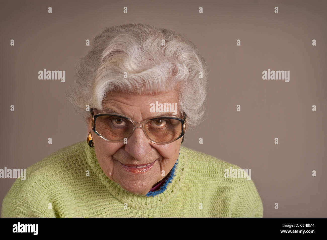 Senior lady portrait, smiling, glasses, with copy space Stock Photo - Alamy