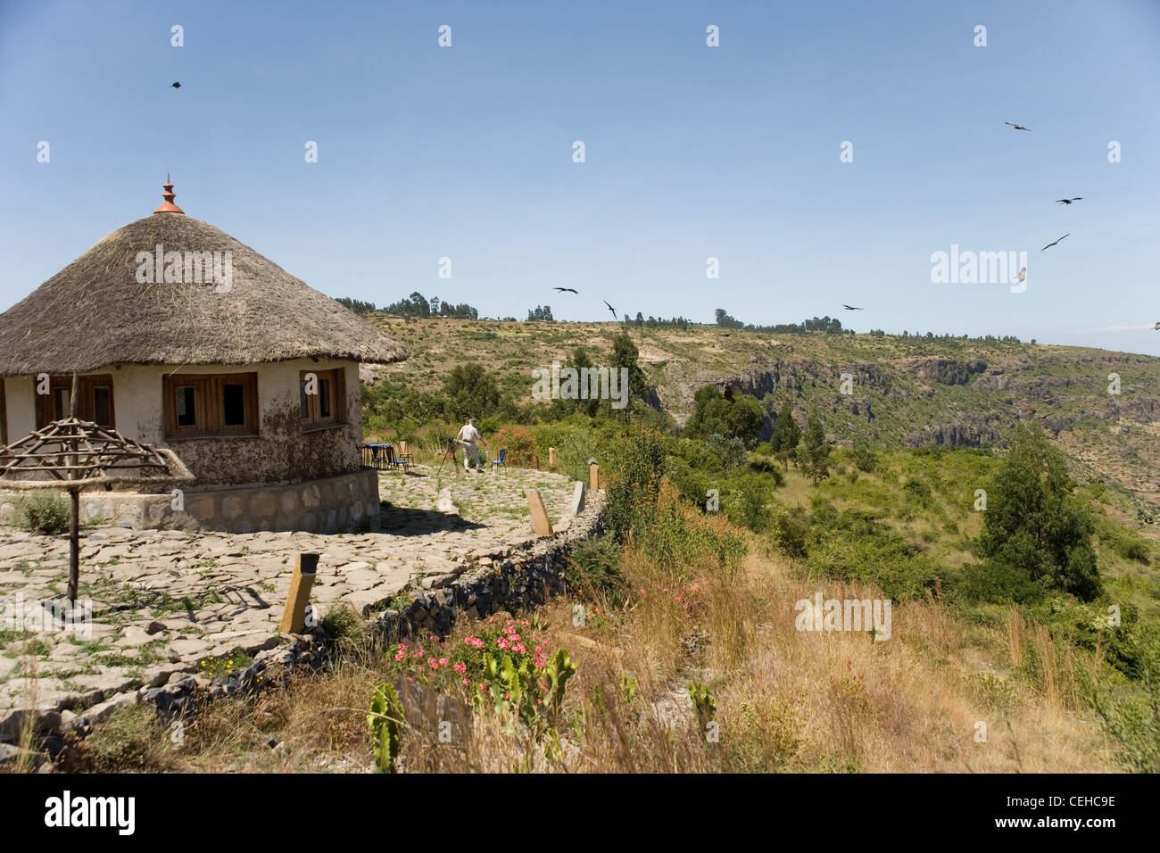 Birdwatchers at a small hotel overlooking the African Rift Valley near ...