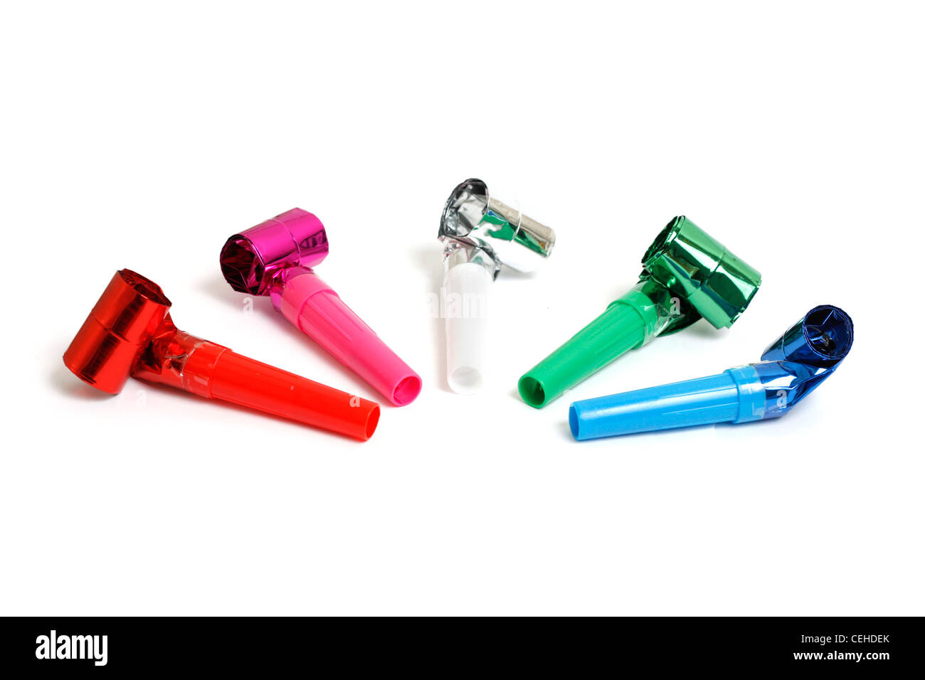 Party blowers isolated on white Stock Photo - Alamy