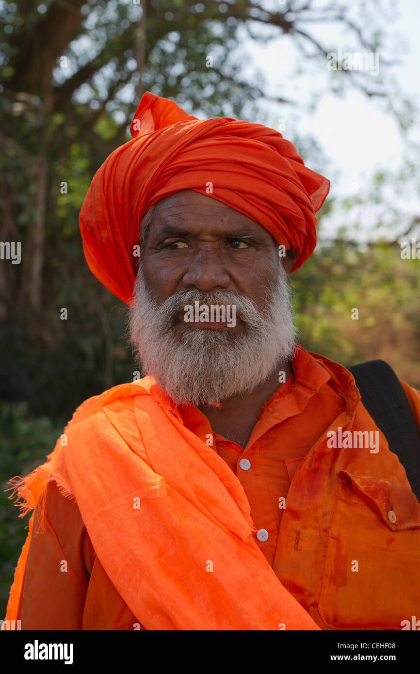 A Hindu monk from the temple who tends the elephant Stock Photo - Alamy