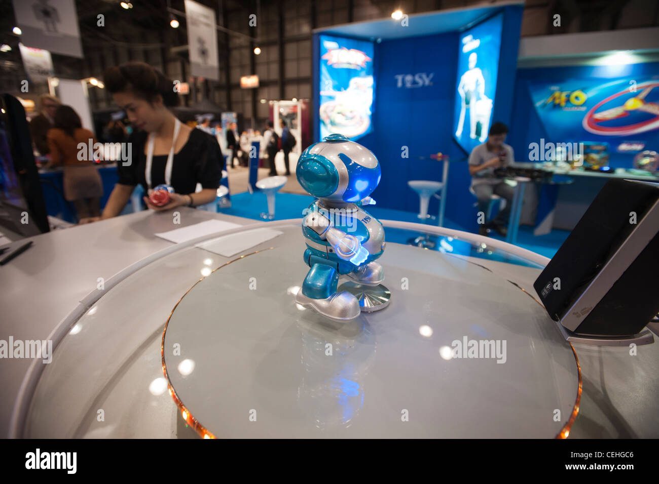 TOSY Robotics demonstrates their DiscoRobo toy as it dances to music at ...