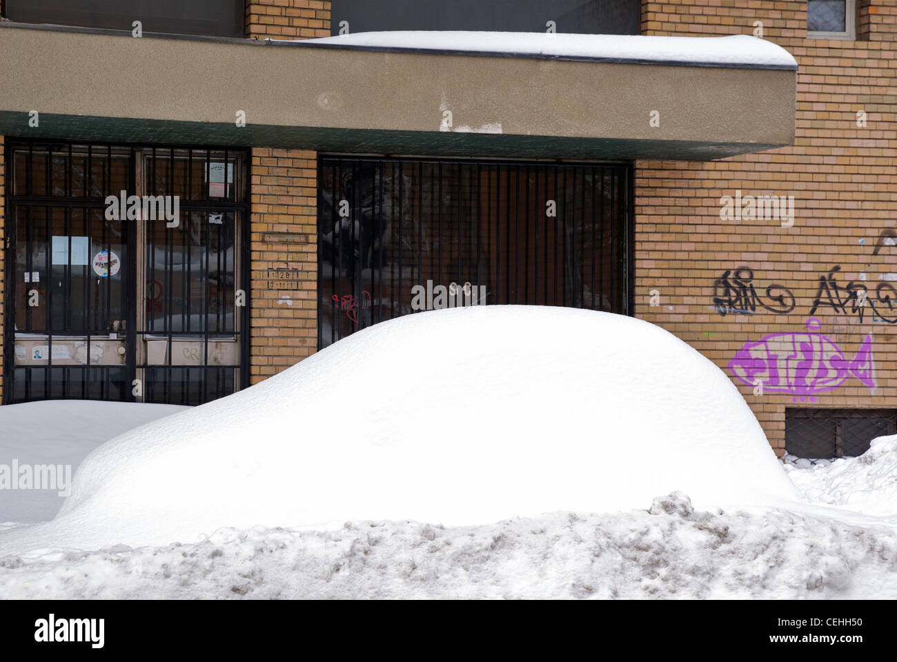 Car completely covered in snow, during the February 2012 snowstorm in ...
