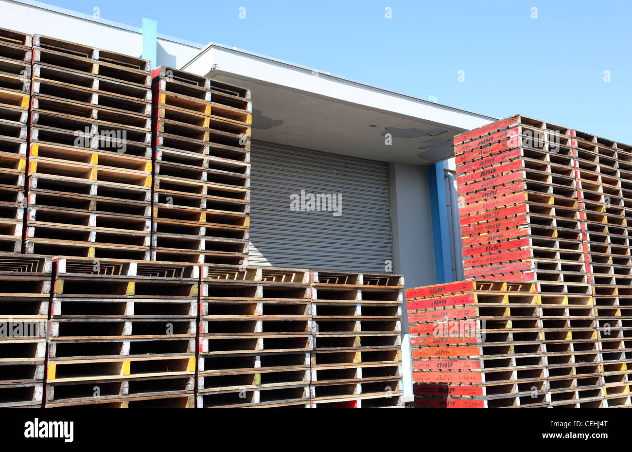 Wooden pallets store on factory yard Stock Photo - Alamy