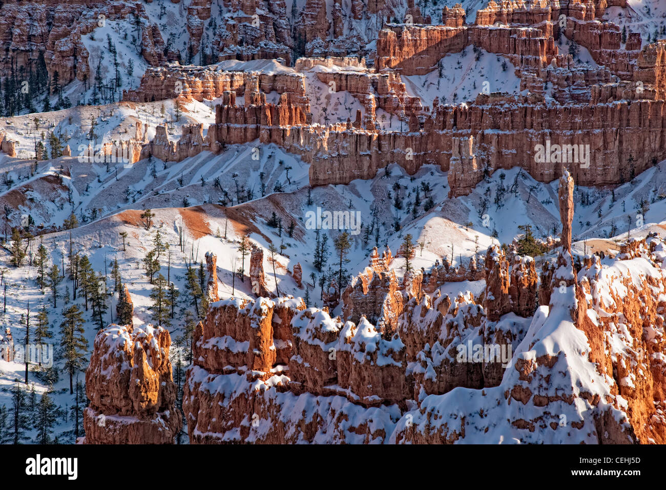 The Sentinel stands prominently among the snow capped hoodoos of Utah’s ...