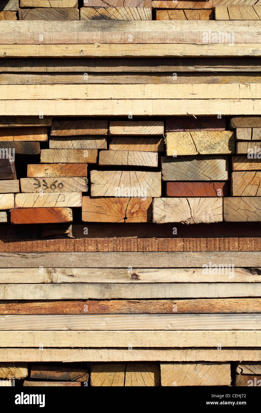 Stack of wood planks on lumber yard Stock Photo - Alamy