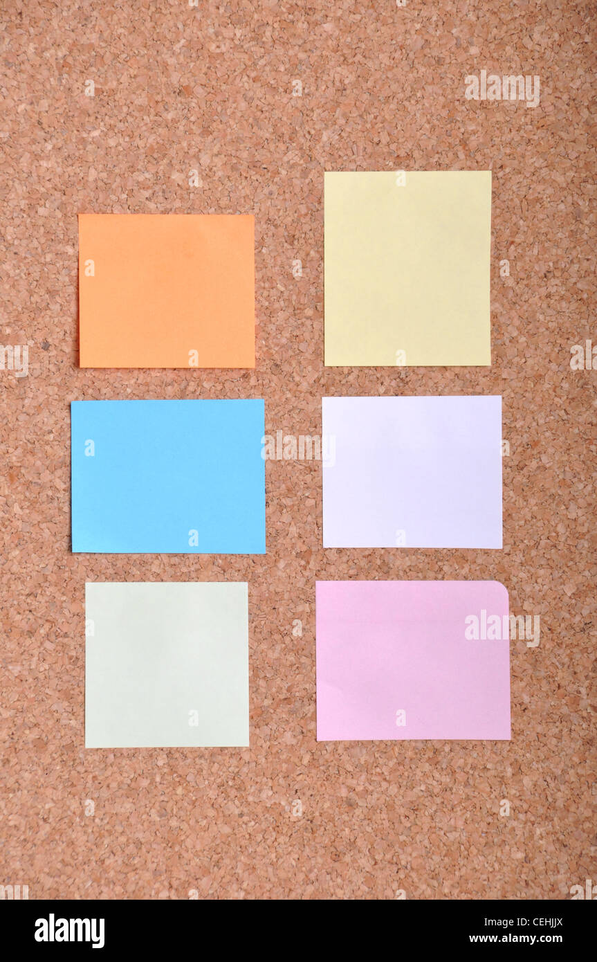 many colorful sticky notes on a bulletin board Stock Photo - Alamy