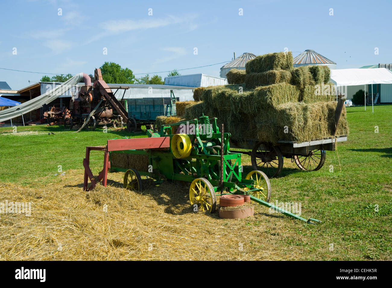 straw packing machine on farm show demonstration Stock Photo - Alamy