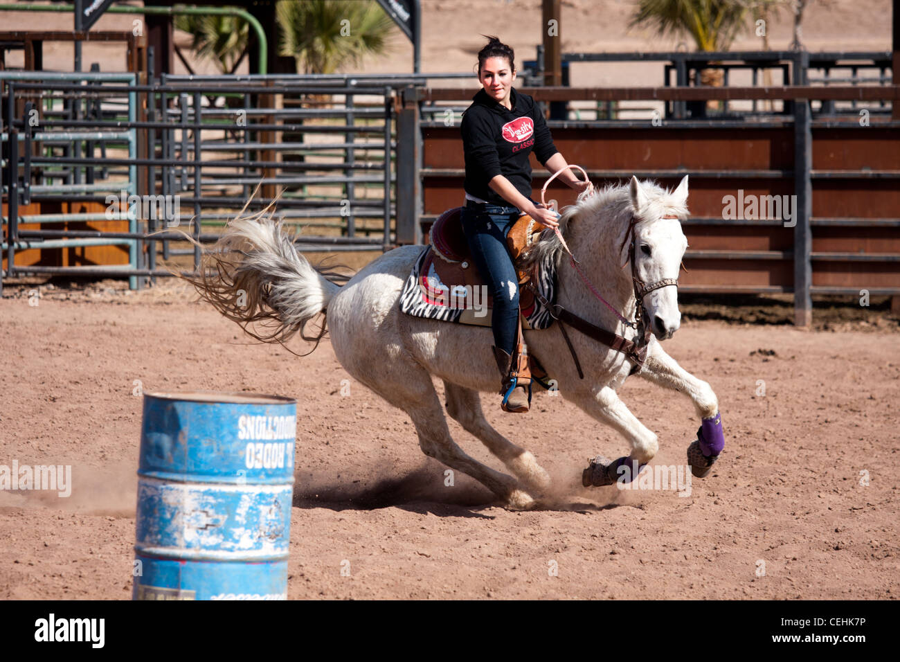 Women horse barrel race in corral in las vegas Stock Photo - Alamy