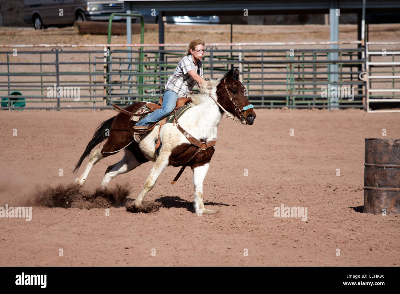 Women horse barrel race in corral in las vegas Stock Photo - Alamy