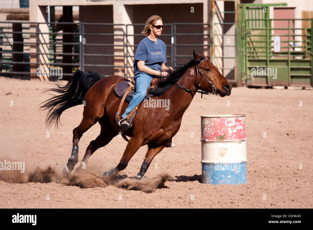 Women horse barrel race in corral in las vegas Stock Photo - Alamy