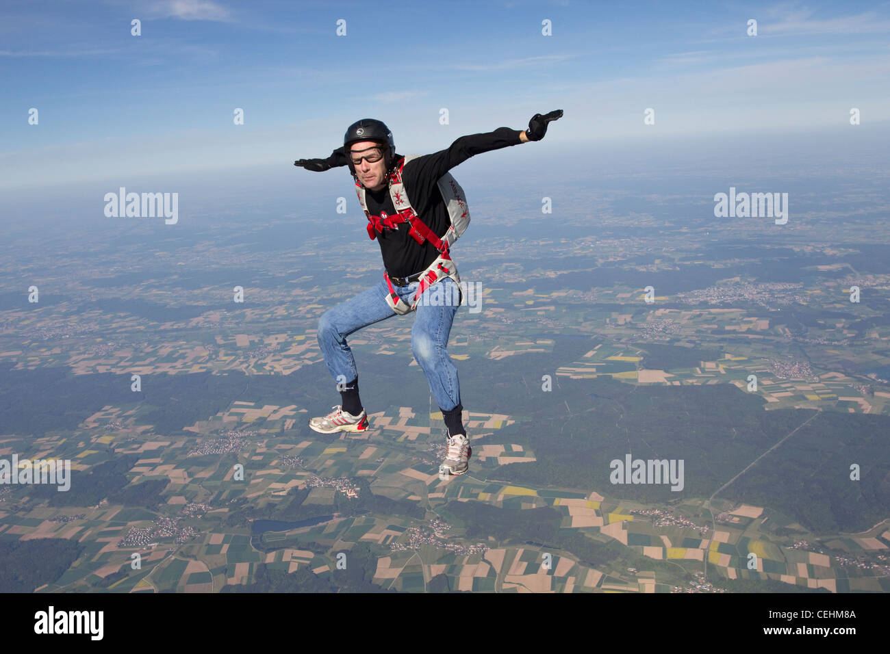 Skydiver jumped out of a plane. He has fun and is training the stable ...