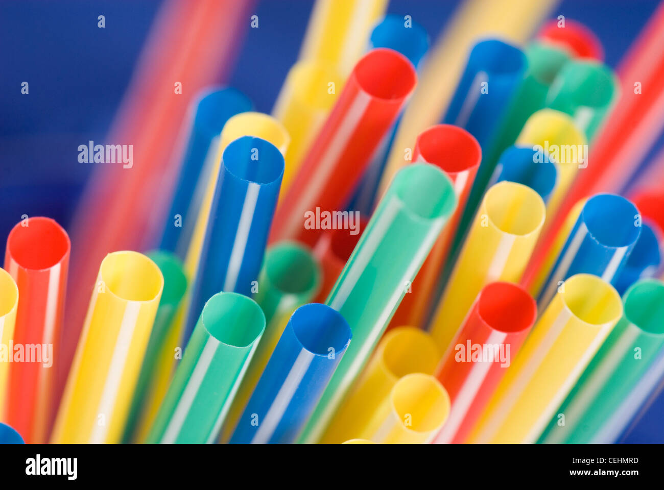 Bunch of colorful drinking straws on a bright background Stock Photo ...