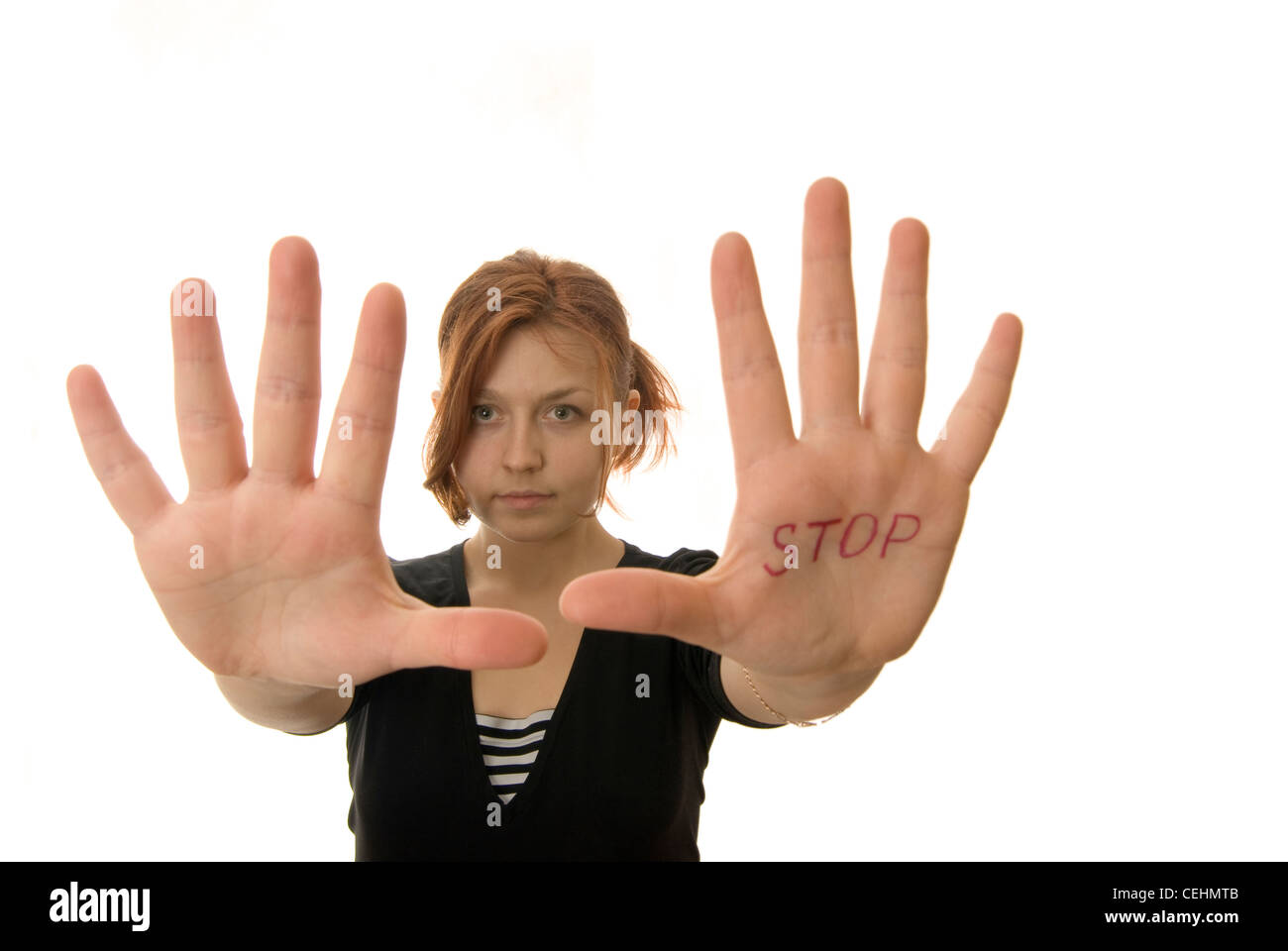 Girl showing "Stop!" gesture with her hands Stock Photo - Alamy