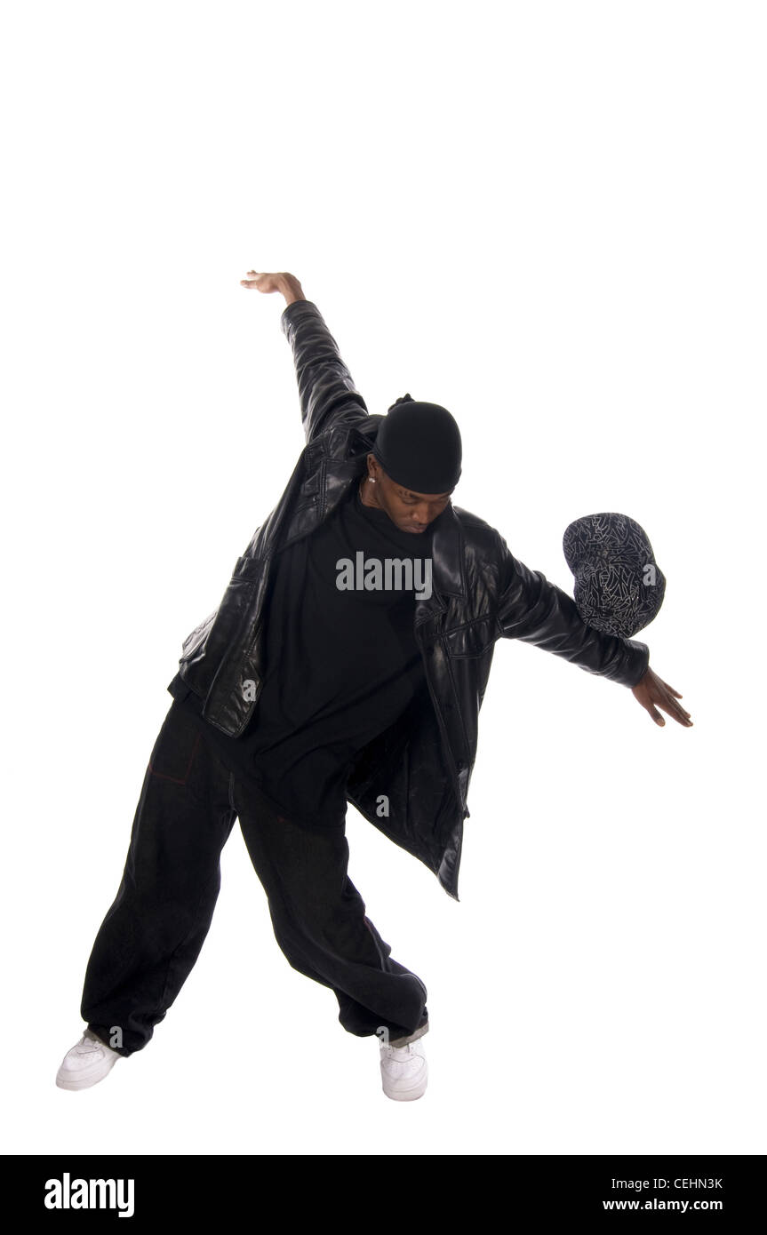 Cool young hip-hop dancer on white background Stock Photo - Alamy