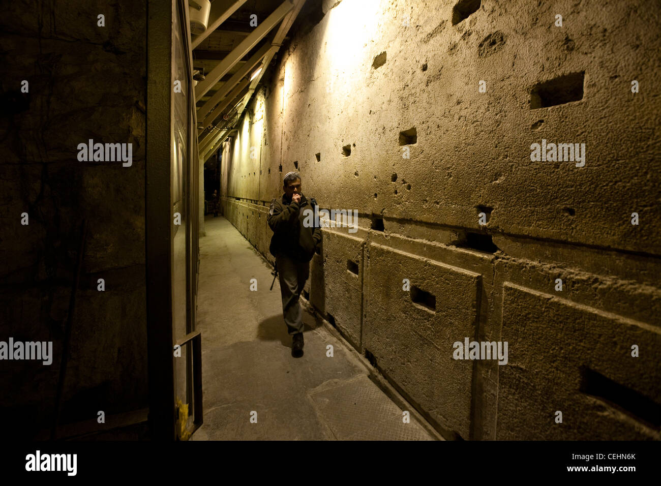 An Israeli soldier walks along the 517-tonne monolithic stone ashlar ...