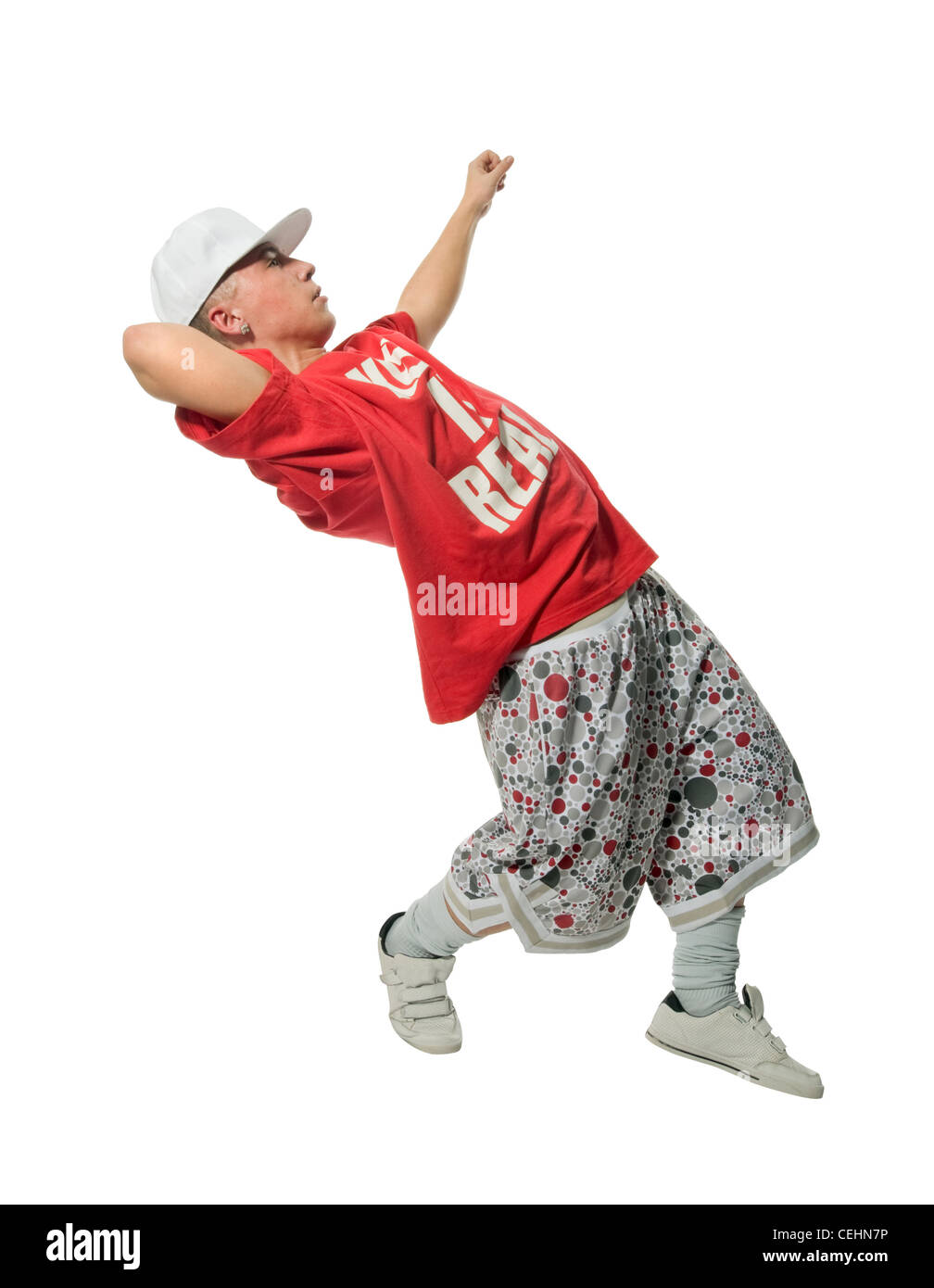 Cool young hip-hop dancer on white background Stock Photo - Alamy