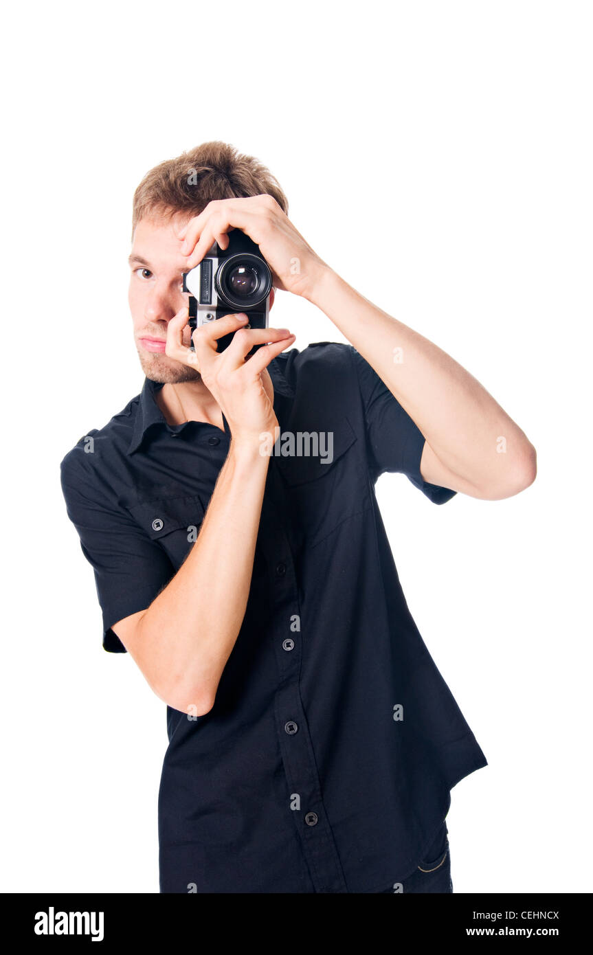 Young man with camera isolated on white background Stock Photo - Alamy