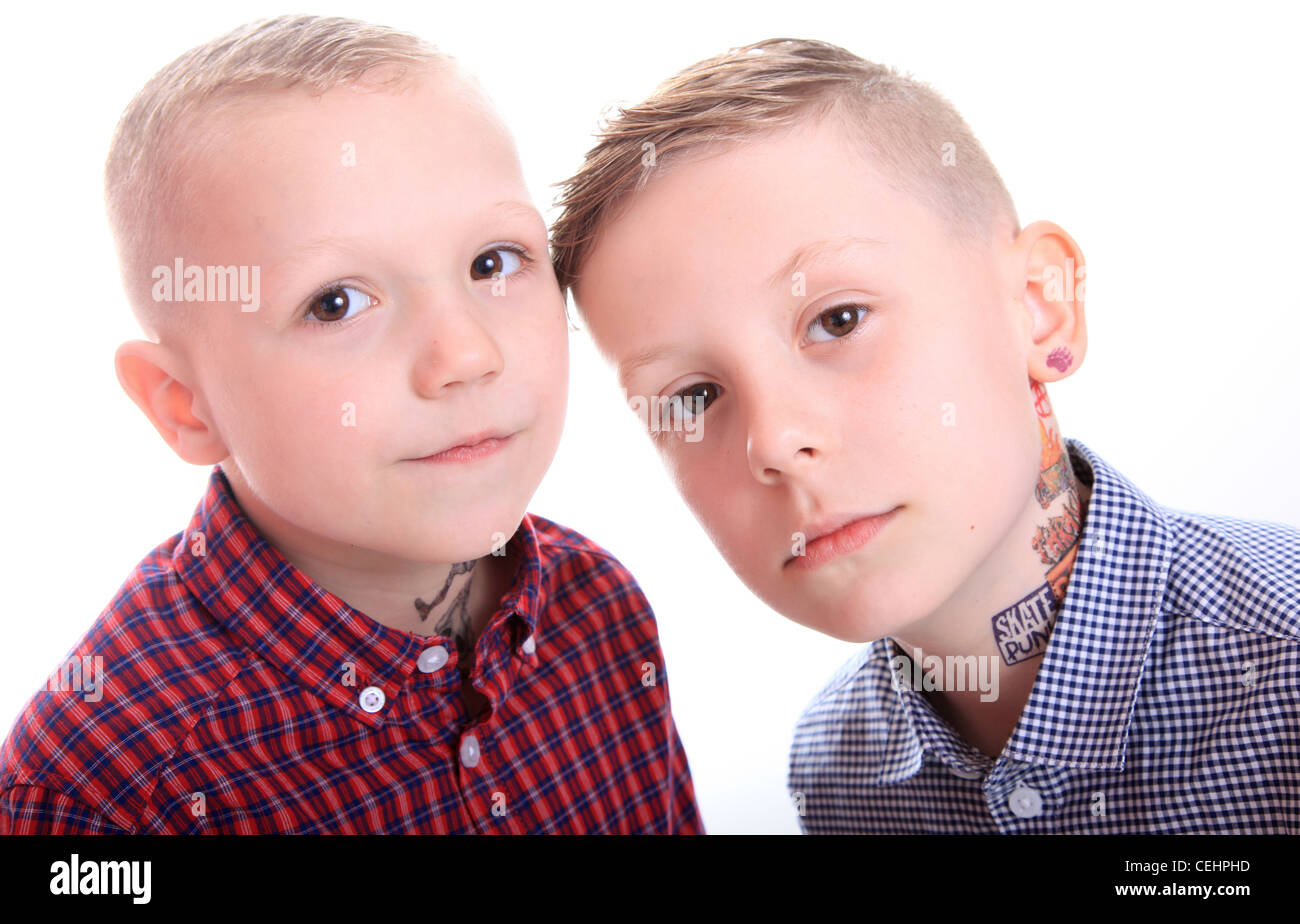 Studio portrait of 2 brothers Stock Photo - Alamy