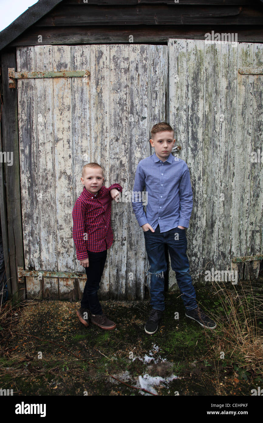 2 brothers posing outside Stock Photo - Alamy