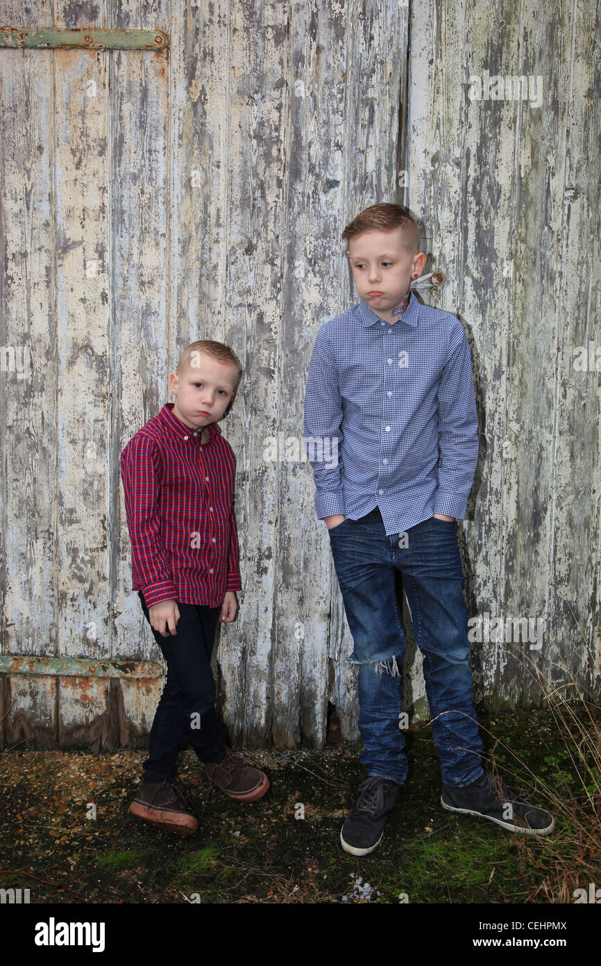 2 brothers posing outside Stock Photo - Alamy