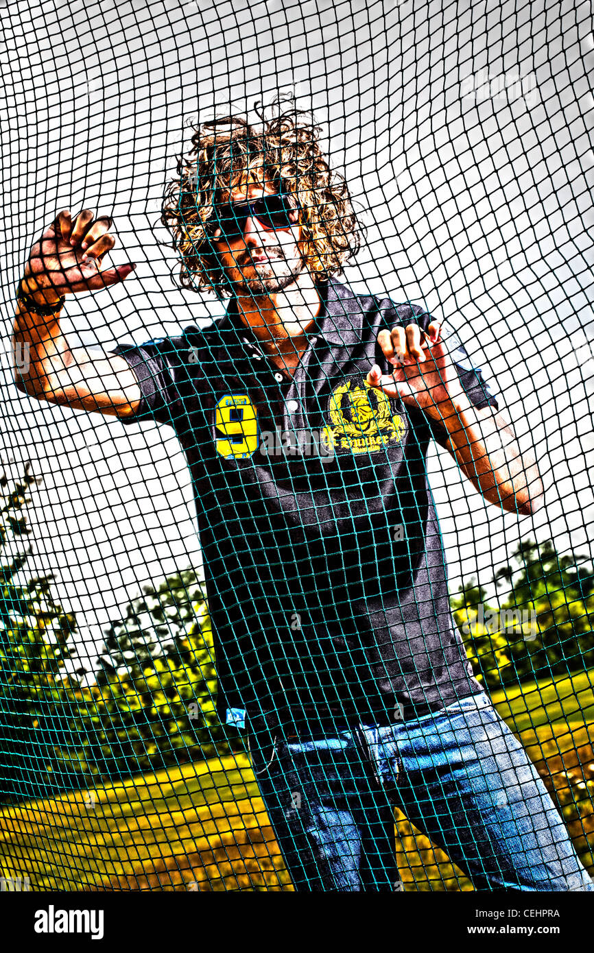 A black and white and colour photograph of a white,male age 20-25 ...