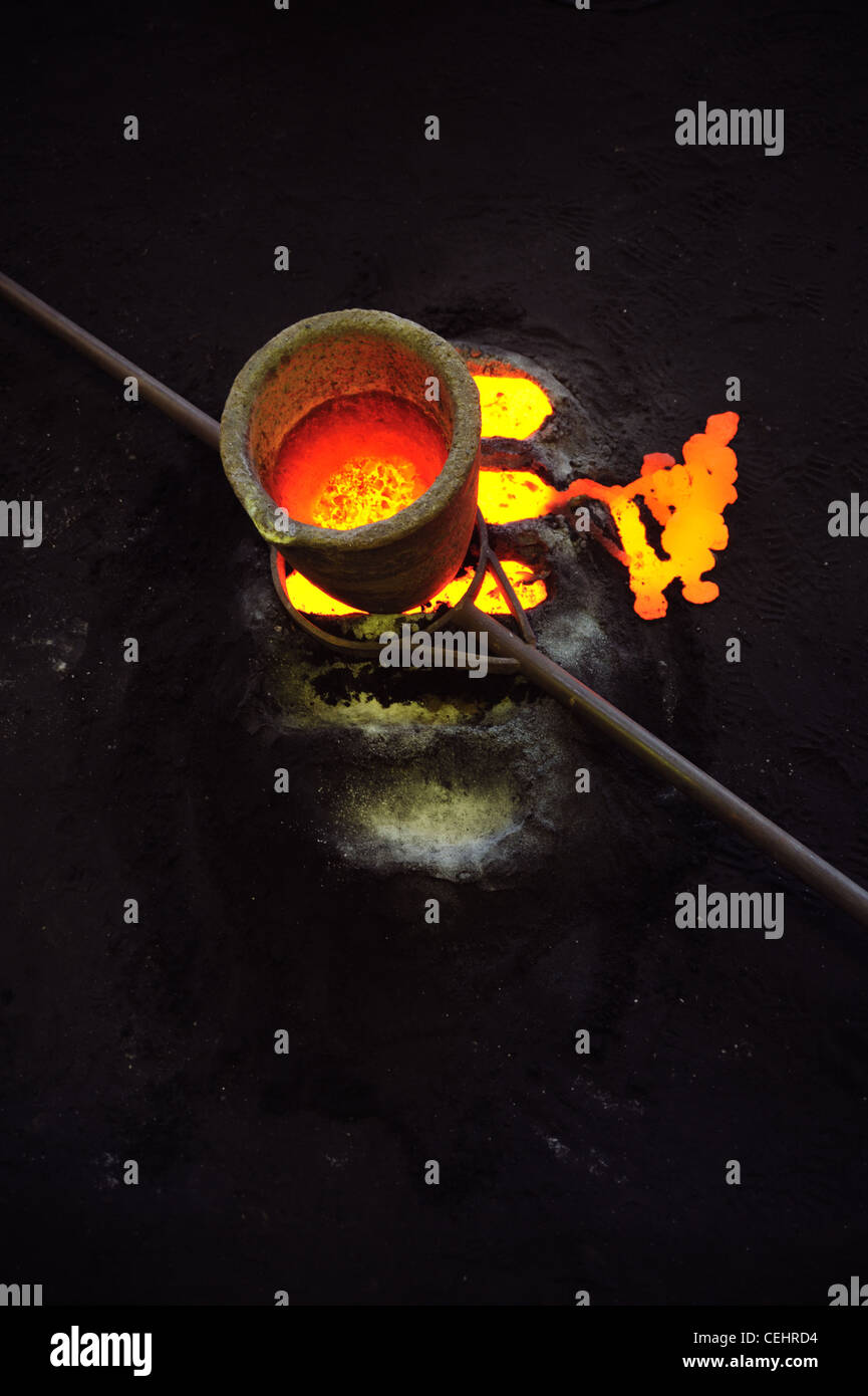 Foundry - molten metal in crucible standing on mould - leftover Stock ...