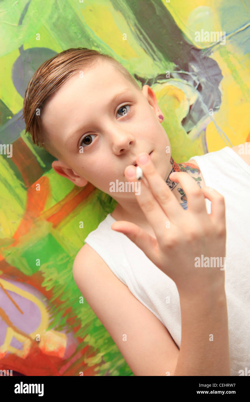 8 -9 yr old boy smoking Stock Photo - Alamy