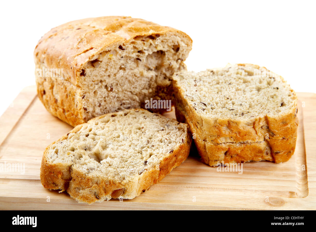The cut loaf of bread with reflaction isolated on white Stock Photo - Alamy