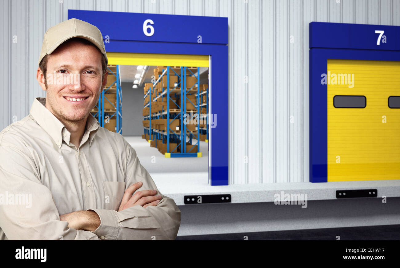 smiling worker outside of warehouse Stock Photo - Alamy