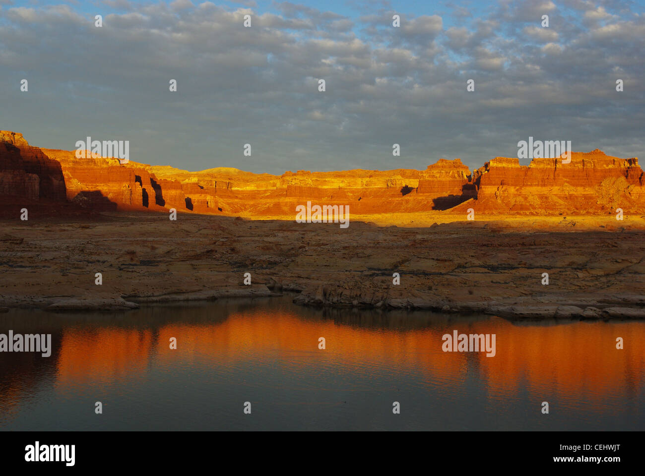 Sunset red rock reflection on Colorado River, Utah Stock Photo - Alamy