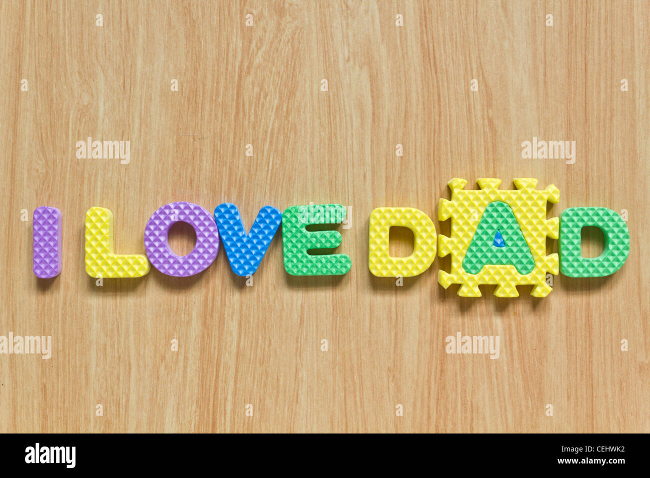 colorful letters with "I love dad" isolated on wood texture Stock Photo ...