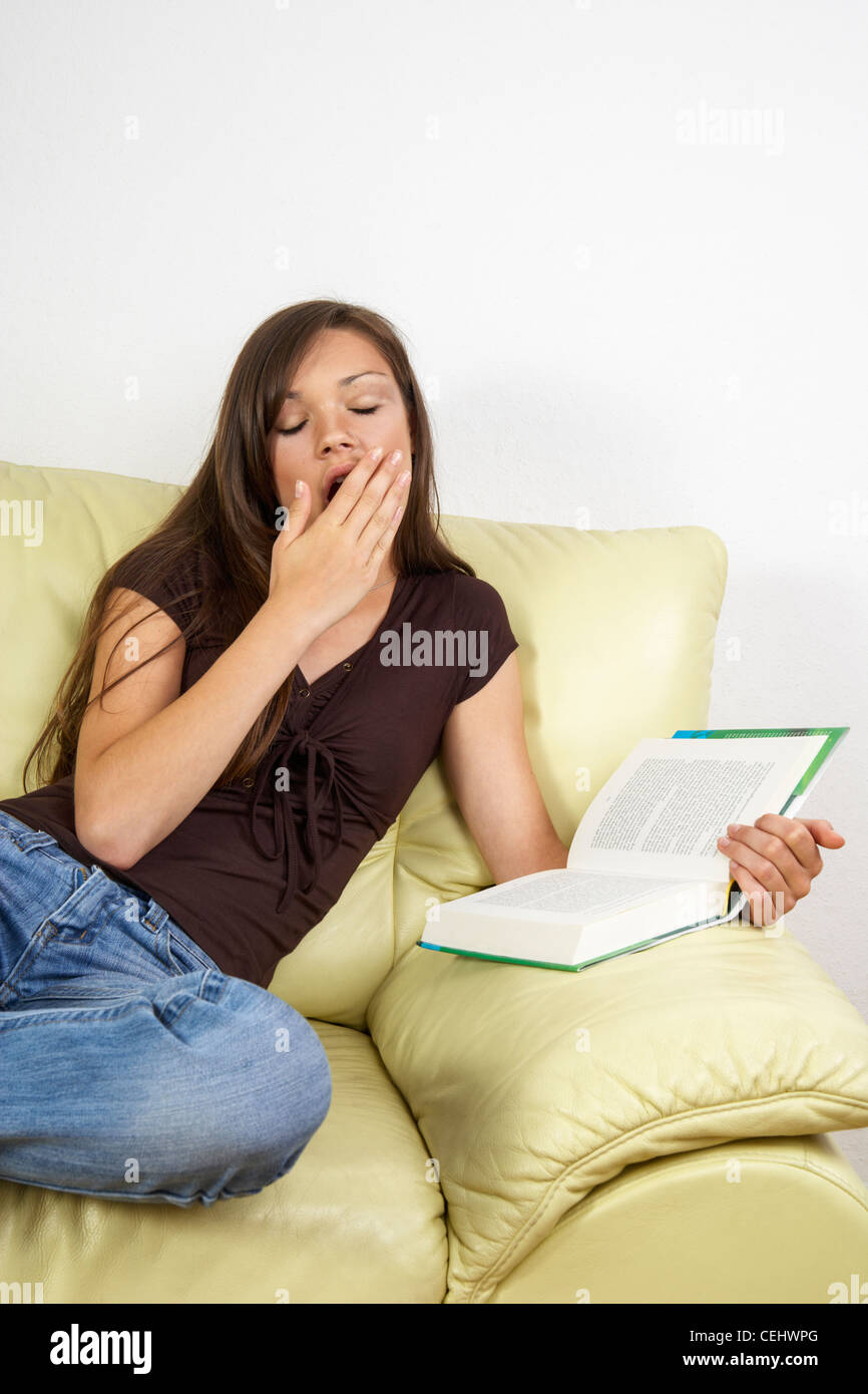 Girl reading a book Stock Photo - Alamy