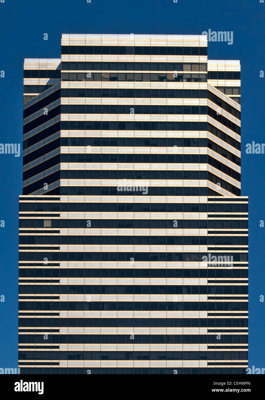 skyscraper view from below against the blue sky Stock Photo - Alamy