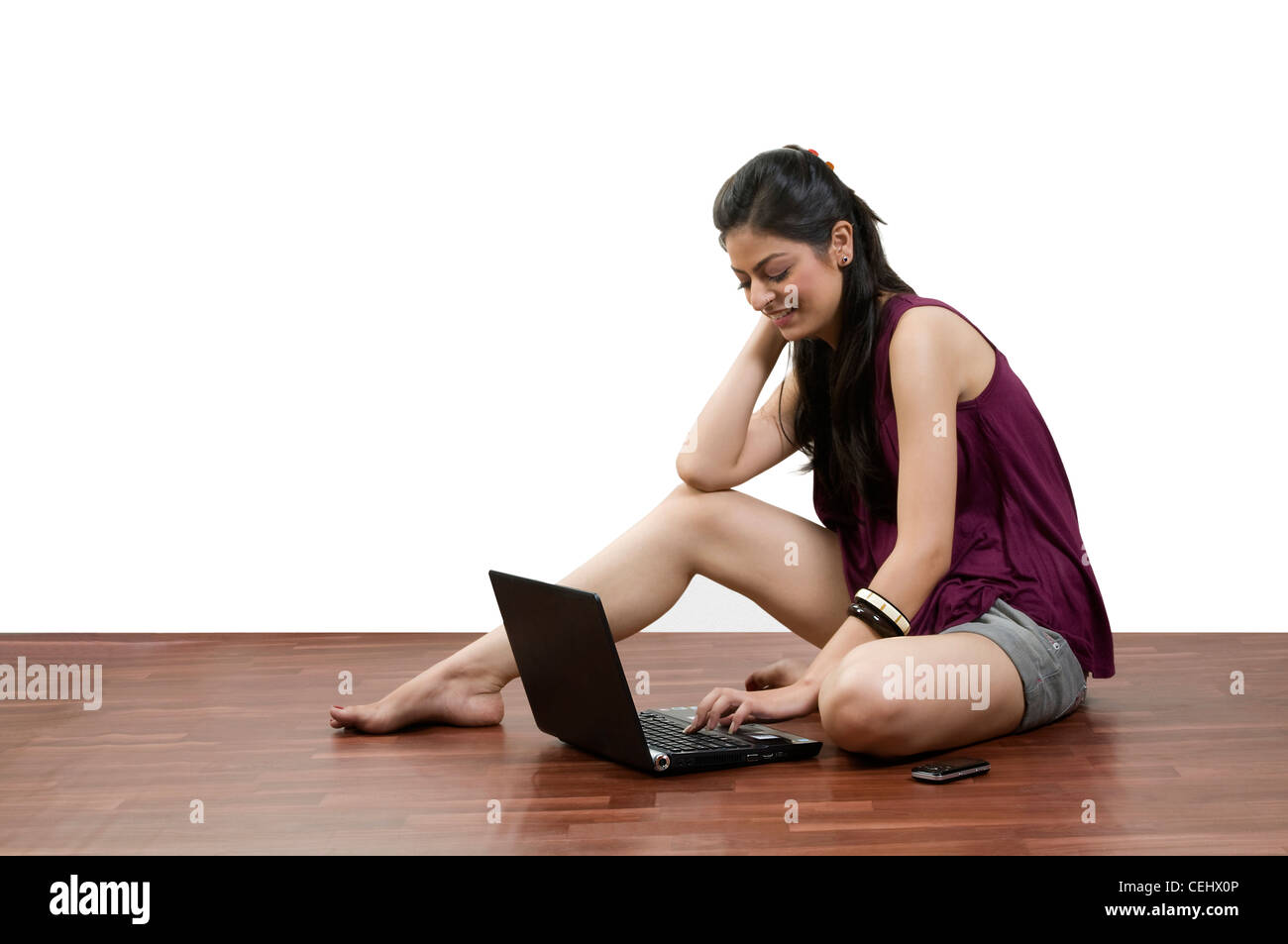 beautiful girl sitting with laptop Stock Photo - Alamy