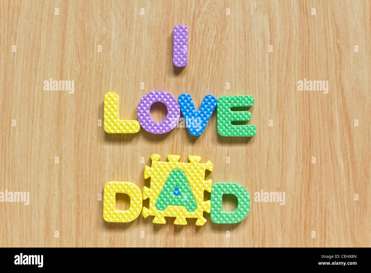 colorful letters with "I love dad" isolated on wood texture Stock Photo ...
