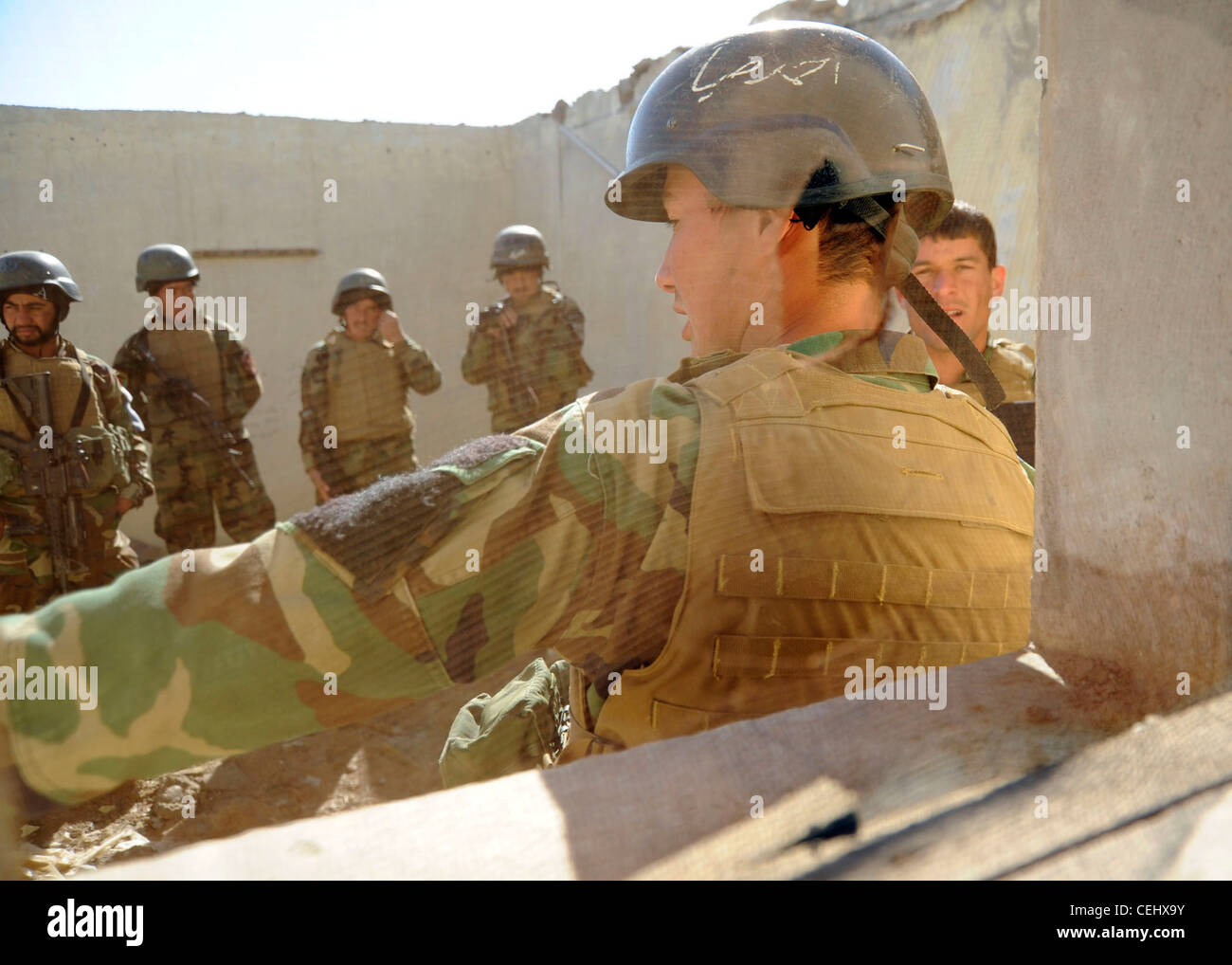 A soldier from the 8th Commando Kandak explains how his team entered a ...