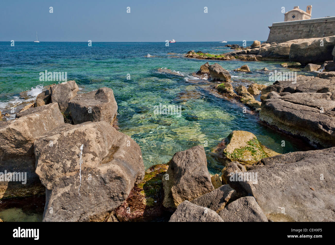 San Pedro and San Pablo church on wall in Tabarca island. Alicante ...