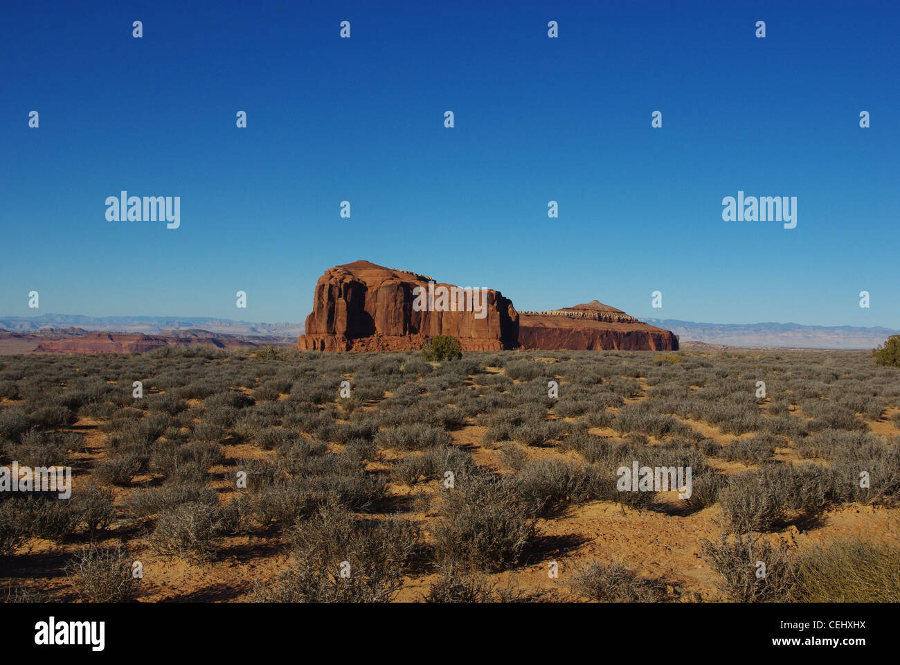 Red rocks in the prairie and blue sky, Utah Stock Photo - Alamy