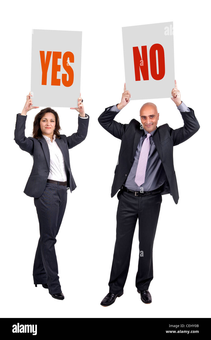 Business couple posing with big boards saying Yes or NO Stock Photo - Alamy