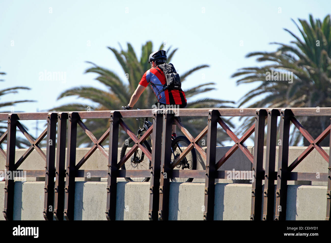 Cyclist crossing bridge hi-res stock photography and images - Alamy