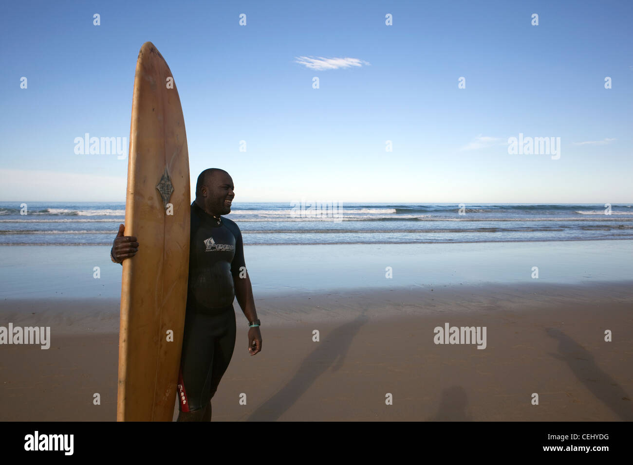 Surfer on the beach,Cintsa,Eastern Cape Stock Photo - Alamy