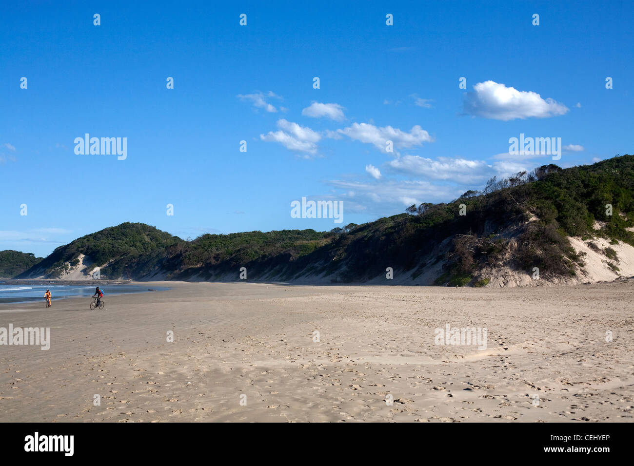 Cyclist on the beach Cintsa,Eastern Cape Stock Photo - Alamy
