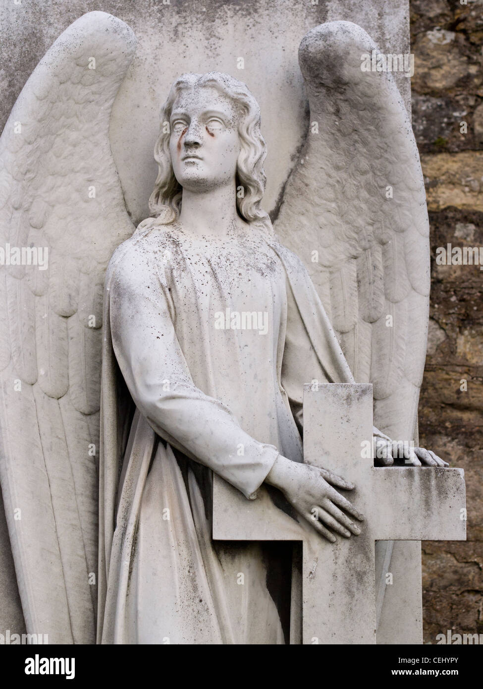 Angel with cross hi-res stock photography and images - Alamy
