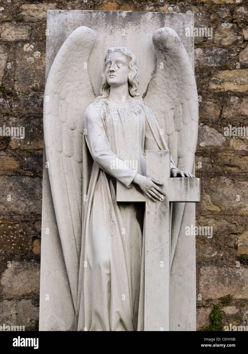 Angel with cross hi-res stock photography and images - Alamy