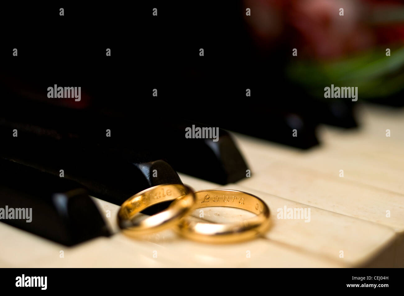 wedding ring on a piano Stock Photo - Alamy