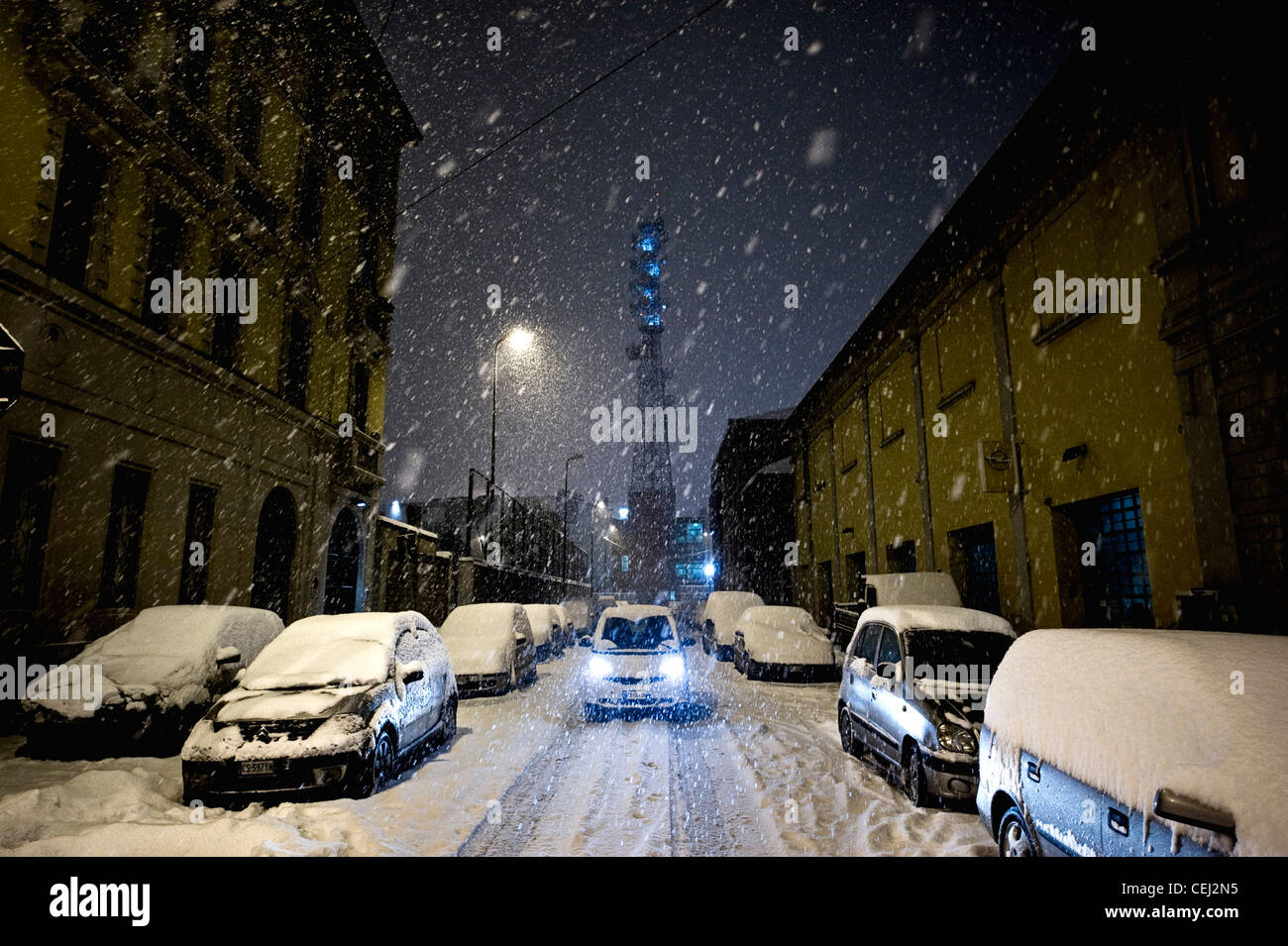 smart city car making its way through the snow in milan, italy Stock ...