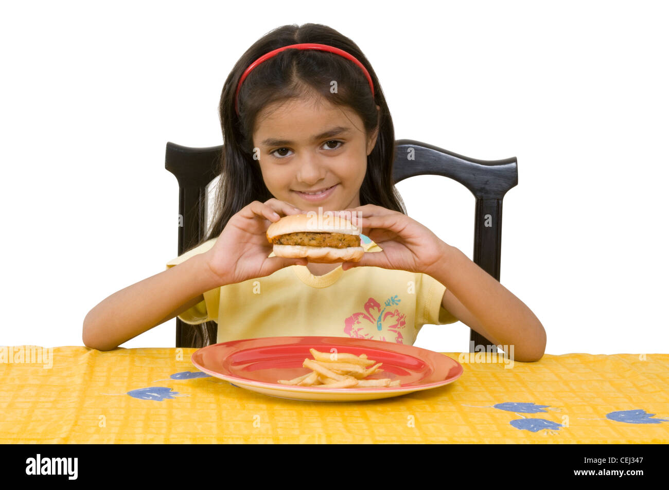 a girl eating Stock Photo - Alamy