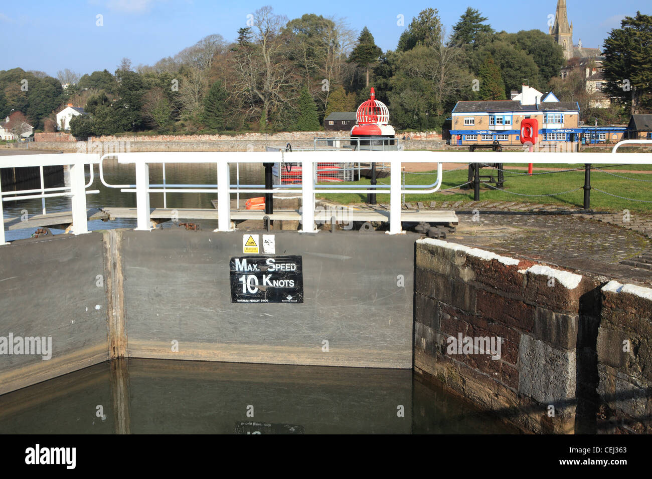 Exeter Canal lock gates, view towards Port Royal, Devon, England, UK ...