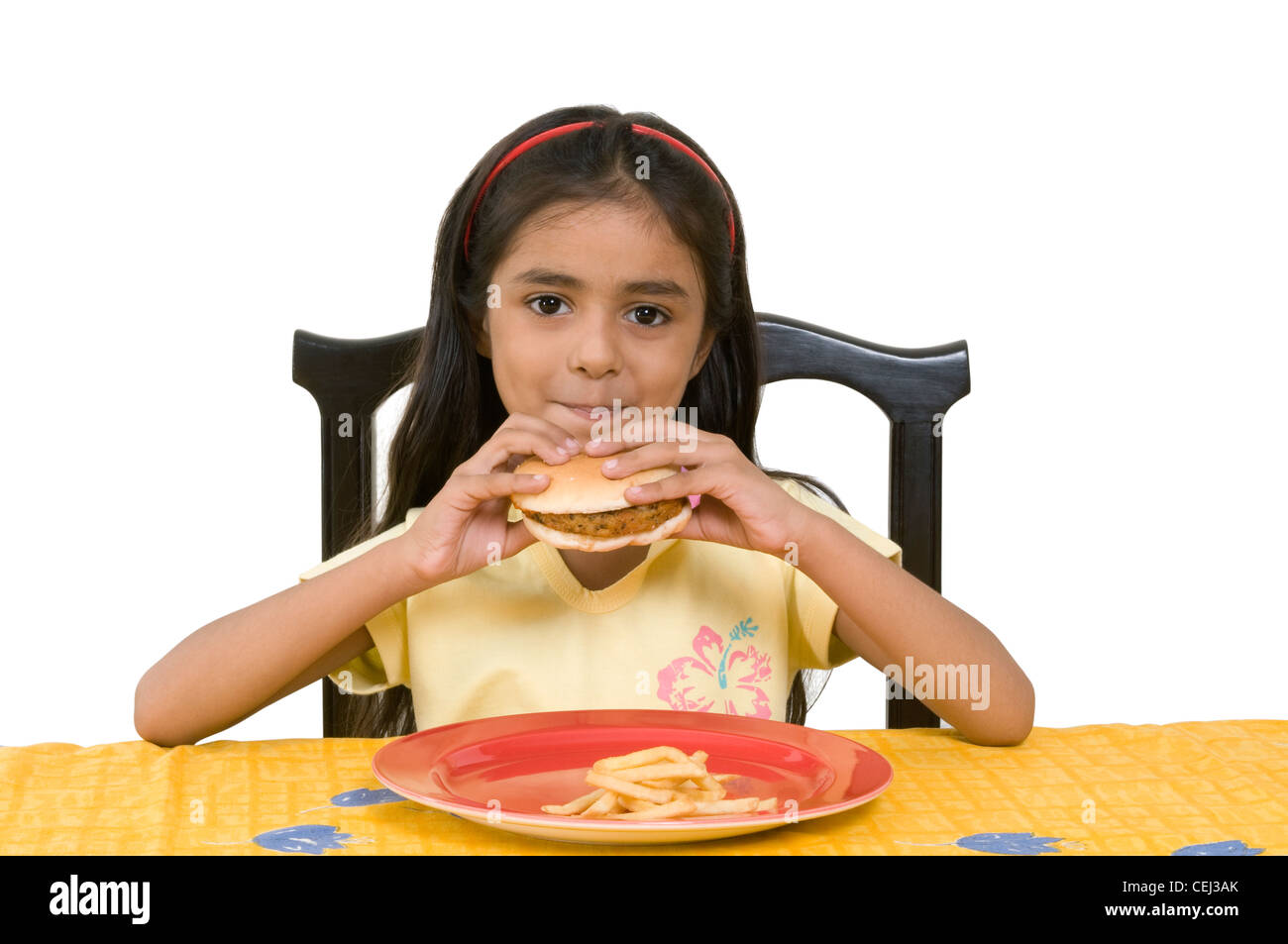 a girl eating Stock Photo - Alamy