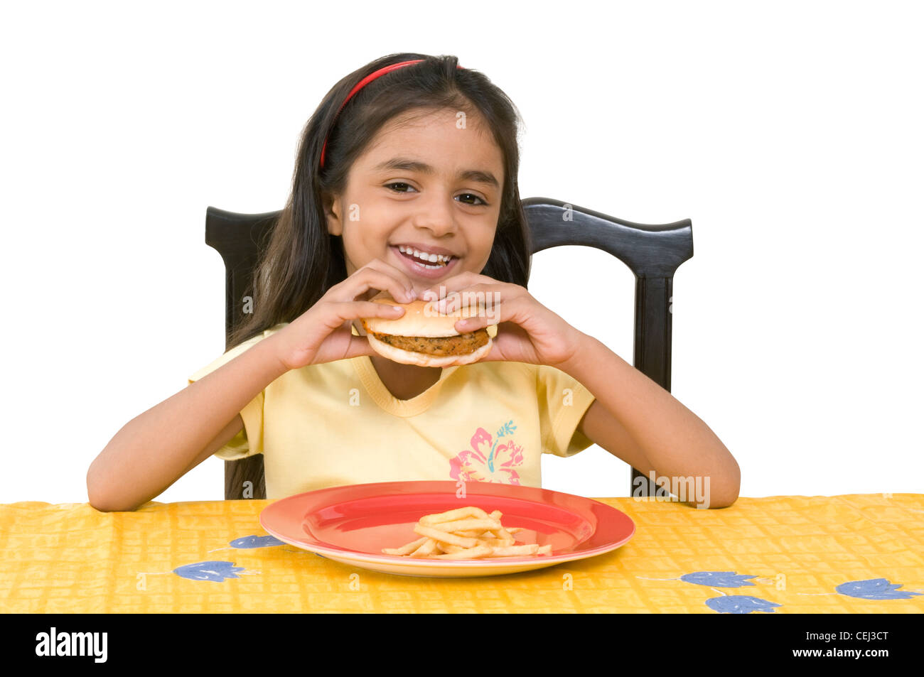 a girl eating Stock Photo - Alamy
